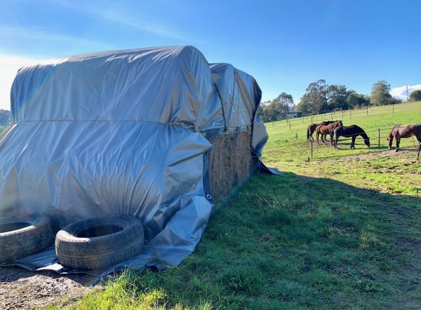 An Innovative way to Cover your Hay Stacks - ARK Tarps